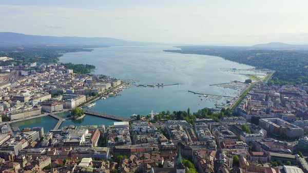 Geneva, Switzerland. Flight over the central part of the city. Lake ...