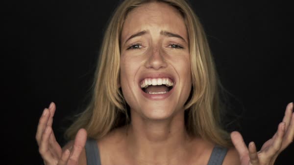 Woman looking up and screaming at camera - HD Royalty-free Stock Video ...