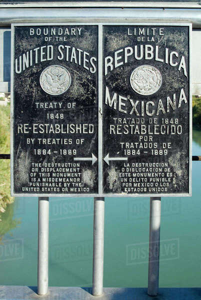 American border signs, Texas, USA. - Stock Photo - Dissolve