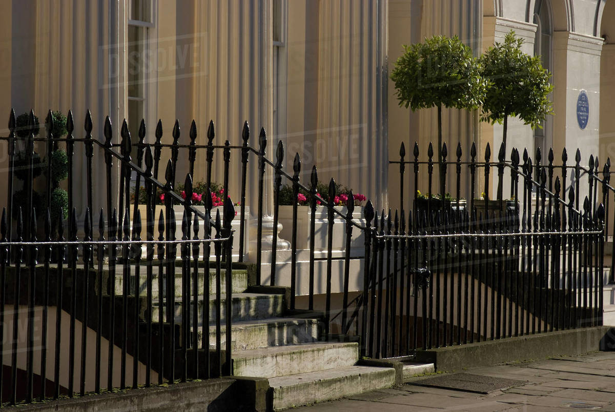 Neo-classical columns and iron gates in London, England. - Royalty-free ...