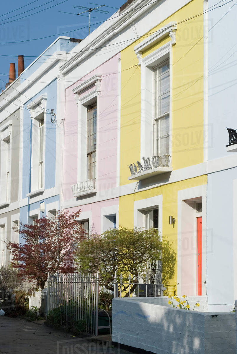 Pastel-coloured row of houses - Royalty-free Stock Photo | Dissolve