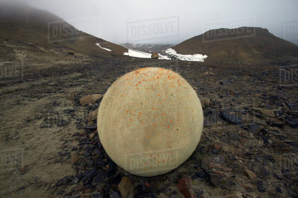 Spherical stone on Champ Island, Franz Josef Land, Russia, July 2004 ...