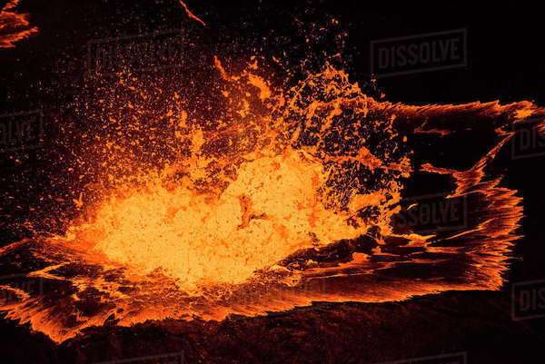 Molten lava boiling in a lava lake in a pit below the crater floor of ...