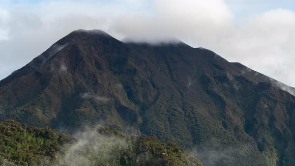 Timelapse of clouds passing over the summit of Sumaco Volcano, with ...