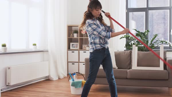Asian woman with broom sweeping floor and cleaning - Stock Video ...