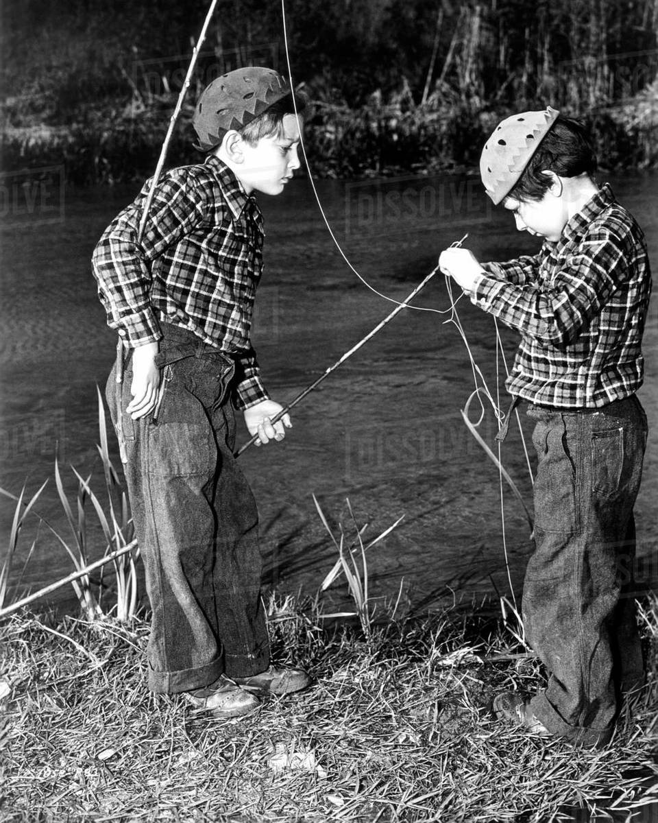 Tangled fishing poles - Royalty-free Stock Photo | Dissolve