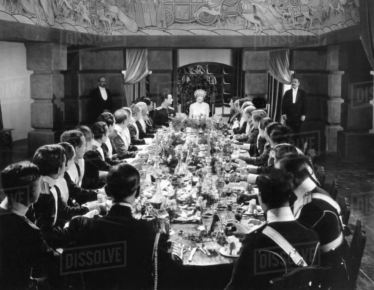 All eyes on the woman at the head of the table - Stock Photo - Dissolve