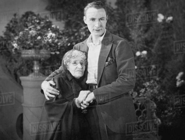 Portrait of man with elderly grandmother - Royalty-free Stock Photo ...