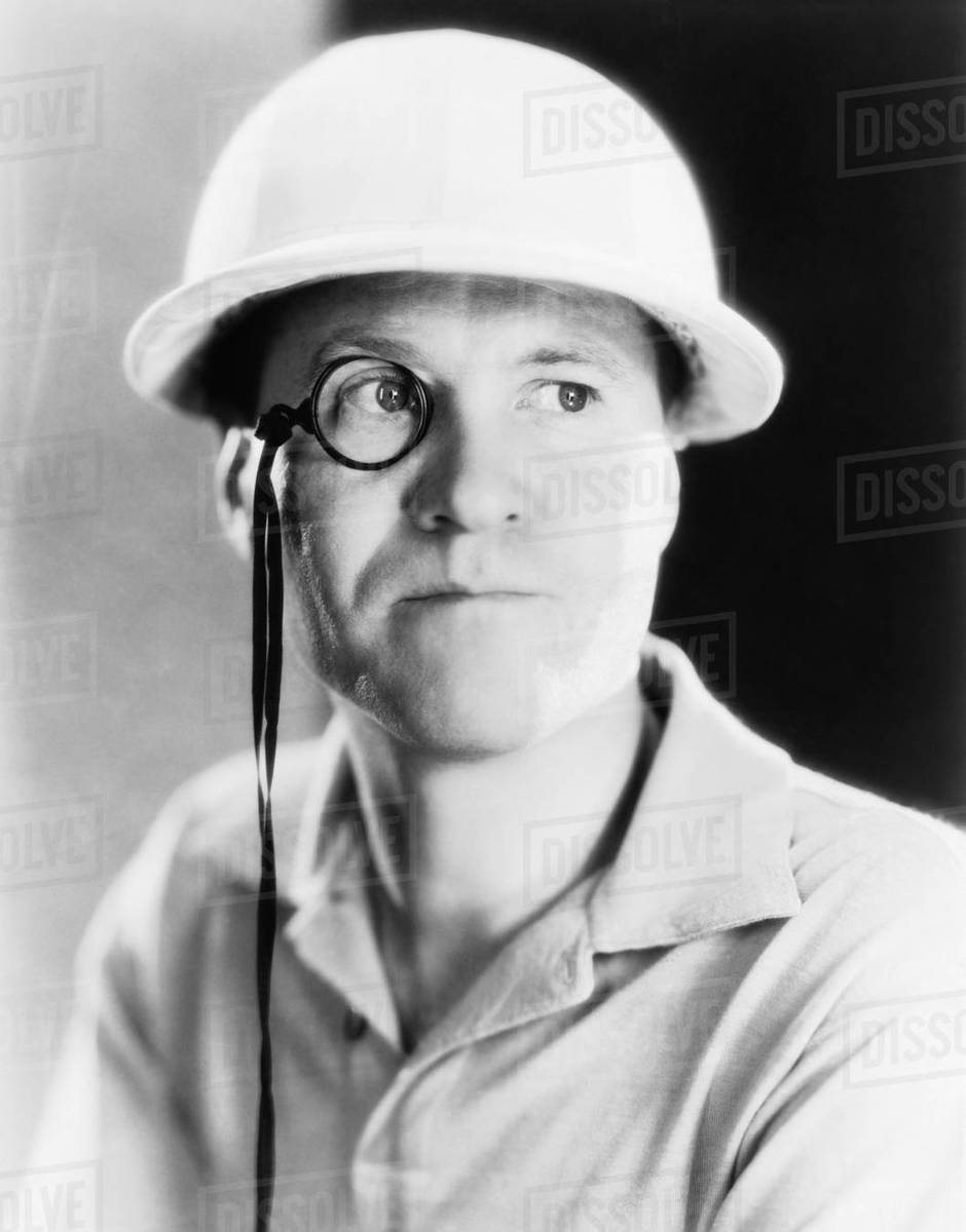 Portrait of man with monocle and helmet - Royalty-free Stock Photo ...