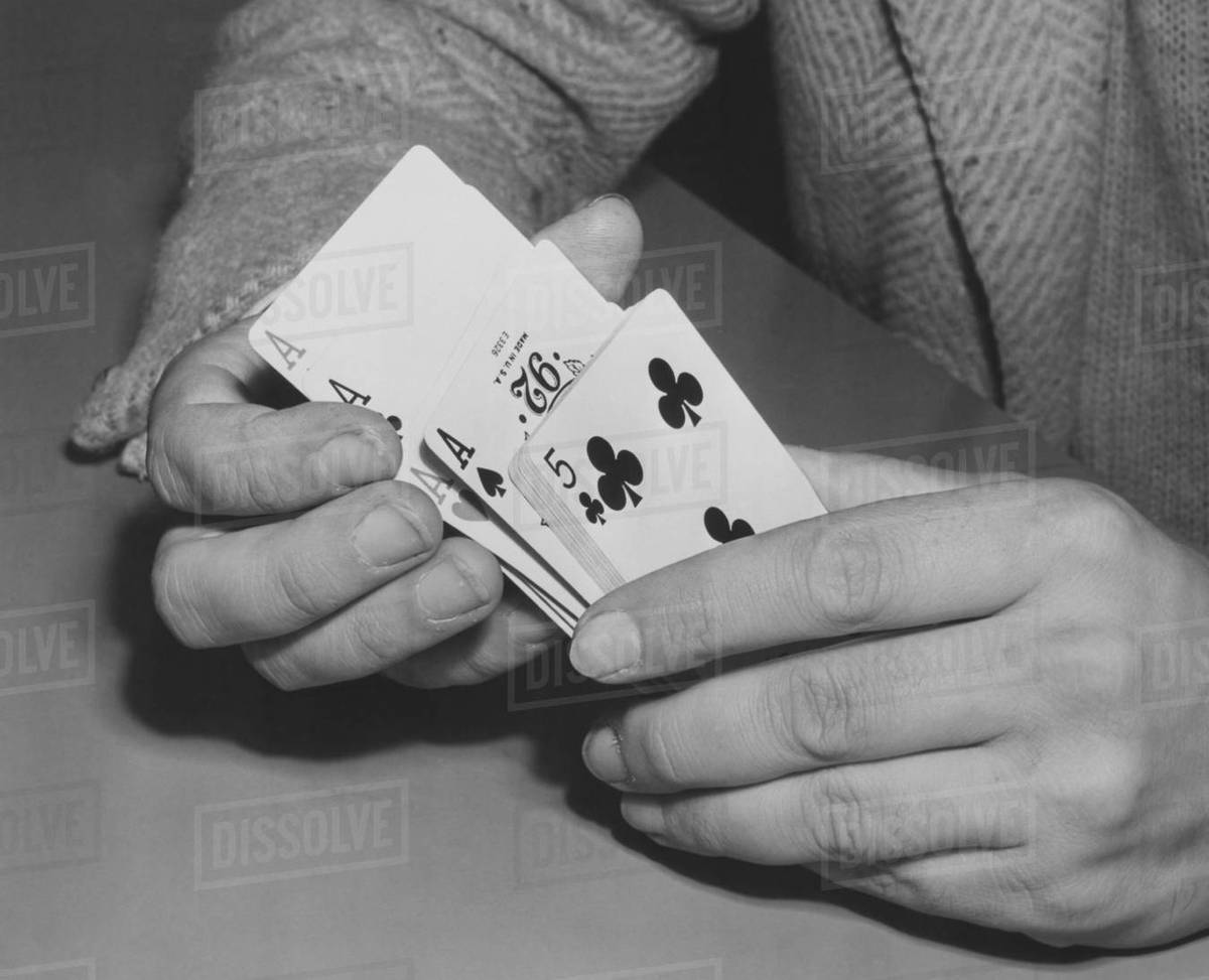 Close-up of man's hands shuffling playing cards - Royalty-free Stock ...