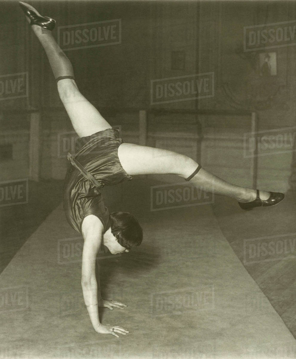 Handstand split - Stock Photo - Dissolve