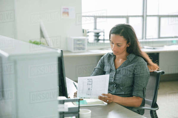 Female office worker writing into a notepad - Royalty-free Stock Photo ...