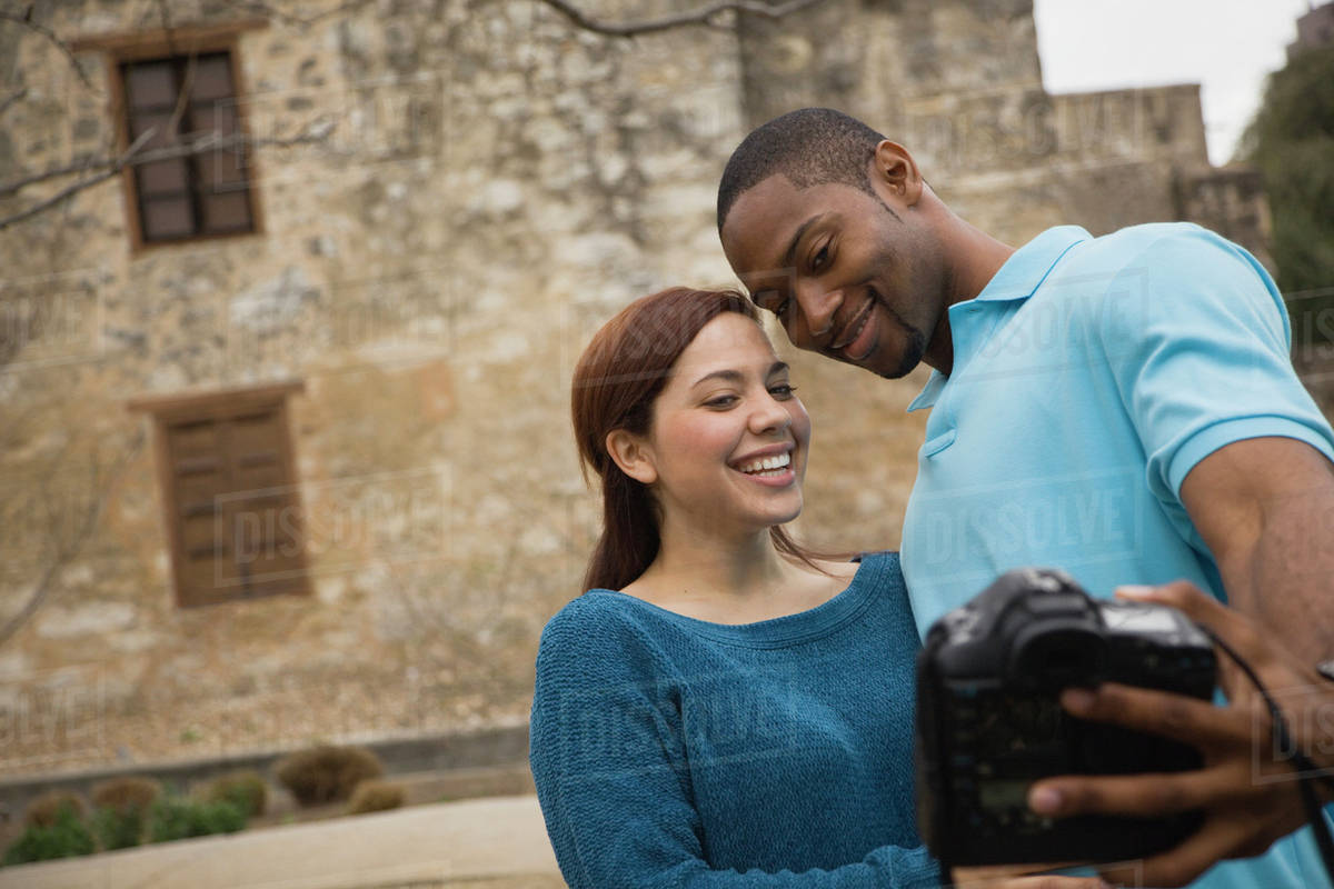 Couple taking self-portrait with digital camera - Royalty-free Stock ...