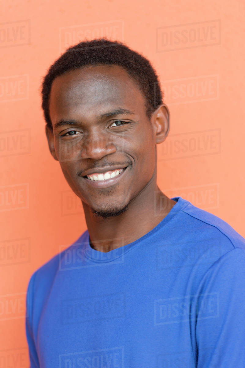 Black man smiling - Royalty-free Stock Photo | Dissolve