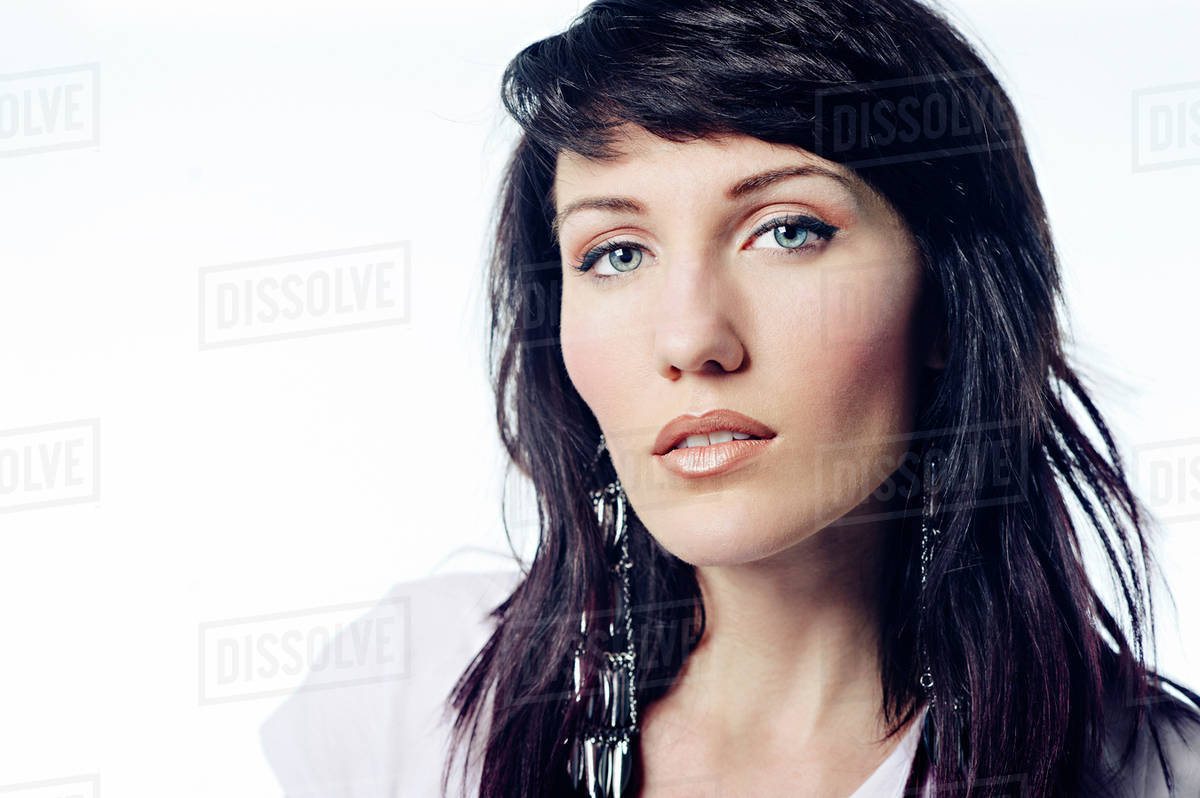 Caucasian woman with serious expression - Stock Photo - Dissolve