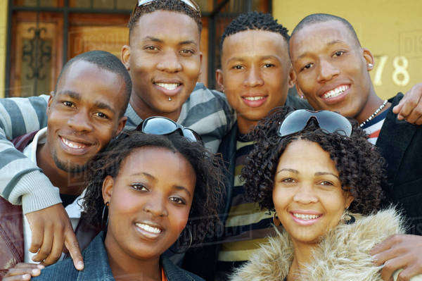 African friends hugging - Stock Photo - Dissolve