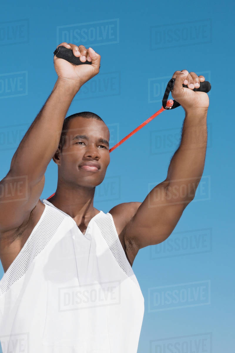 African man stretching with exercise band - Royalty-free Stock Photo ...