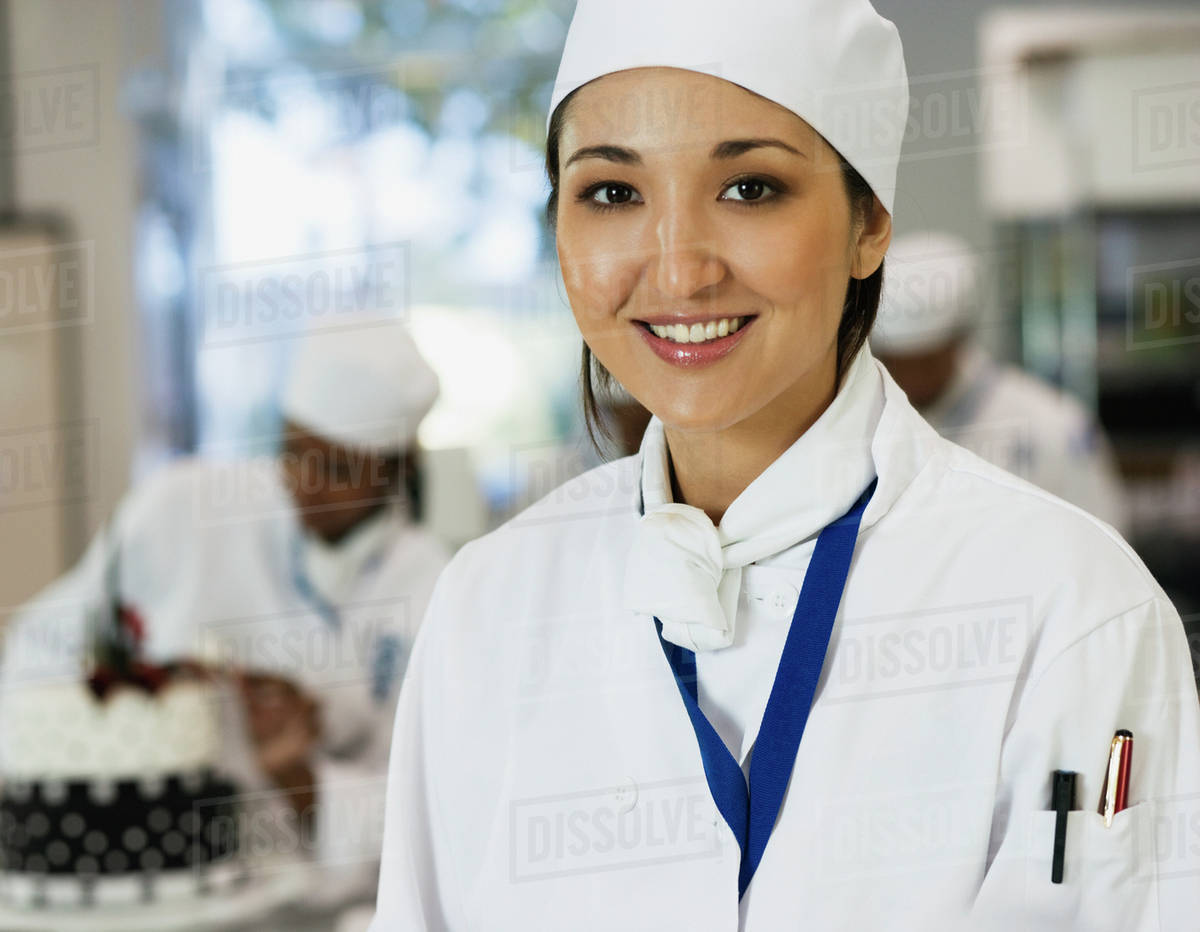 Portrait of Asian female chef - Royalty-free Stock Photo | Dissolve