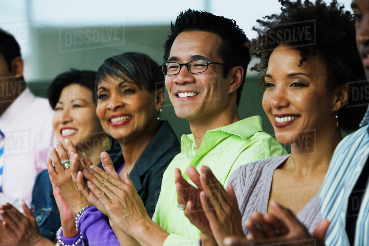 Multi-ethnic business people clapping - Royalty-free Stock Photo | Dissolve
