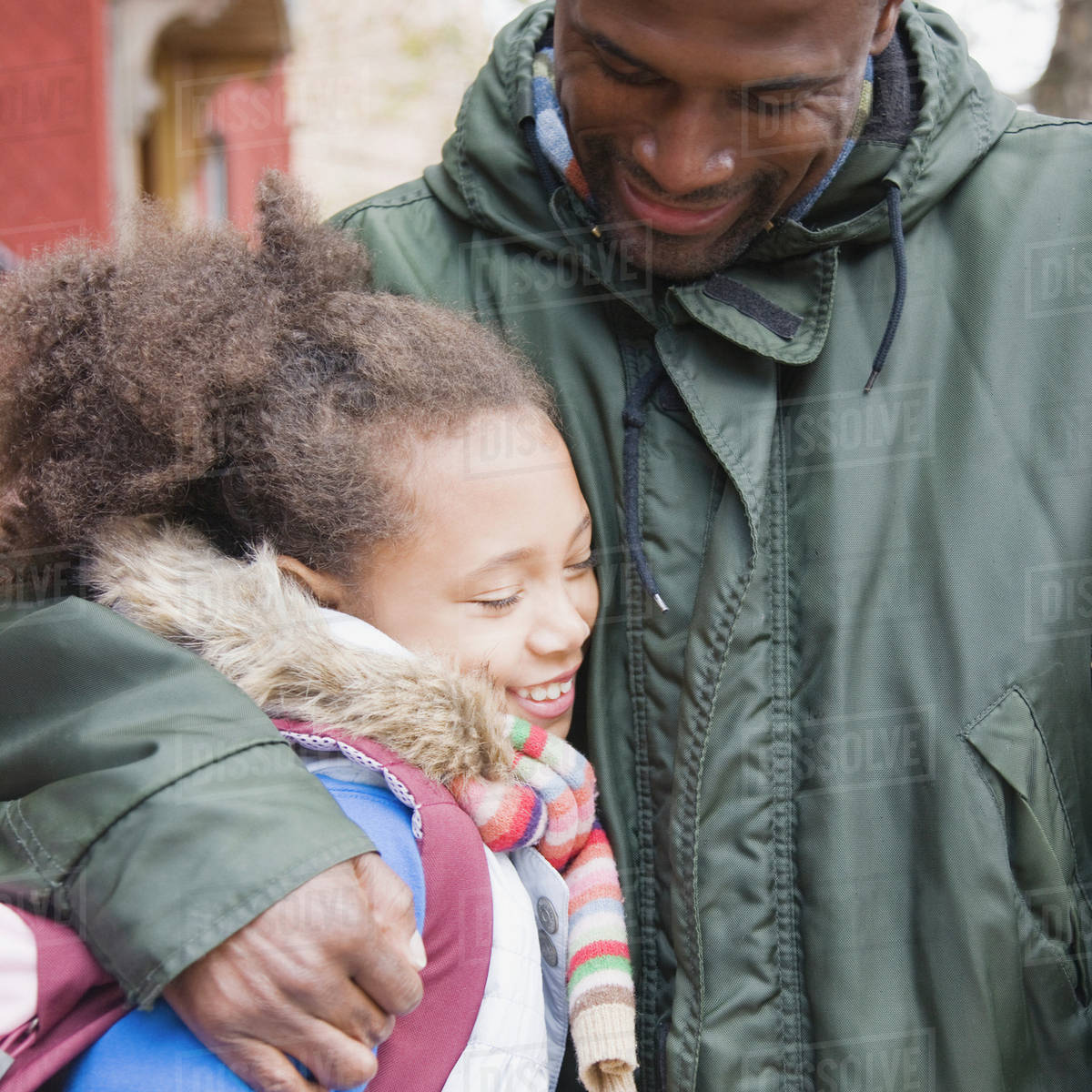 African father hugging daughter - Royalty-free Stock Photo | Dissolve