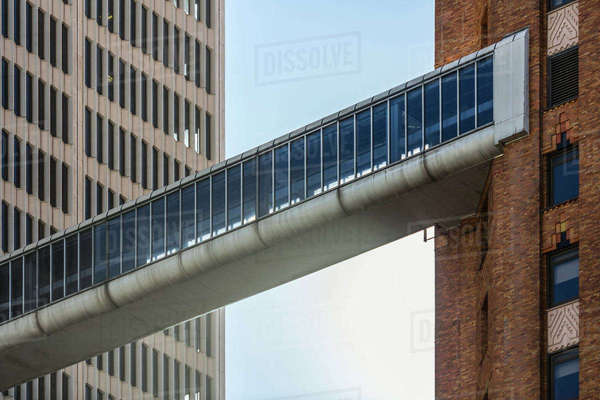 Elevated walkway between highrise buildings - Royalty-free Stock Photo ...