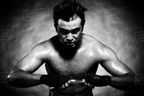 Caucasian boxer athlete flexing his muscles - Royalty-free Stock Photo ...