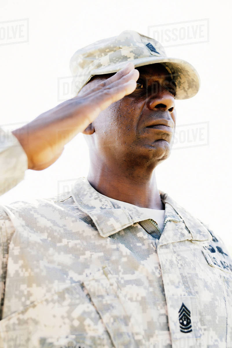 Black soldier saluting - Royalty-free Stock Photo | Dissolve