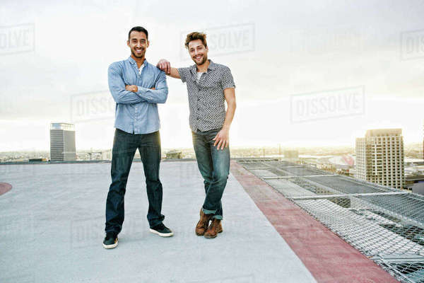 Stylish men posing on urban rooftop - Royalty-free Stock Photo | Dissolve