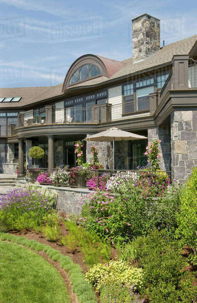 Rear exterior large neo eclectic home - Royalty-free Stock Photo | Dissolve