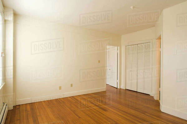 Empty room in apartment with hardwood floor - Royalty-free Stock Photo ...