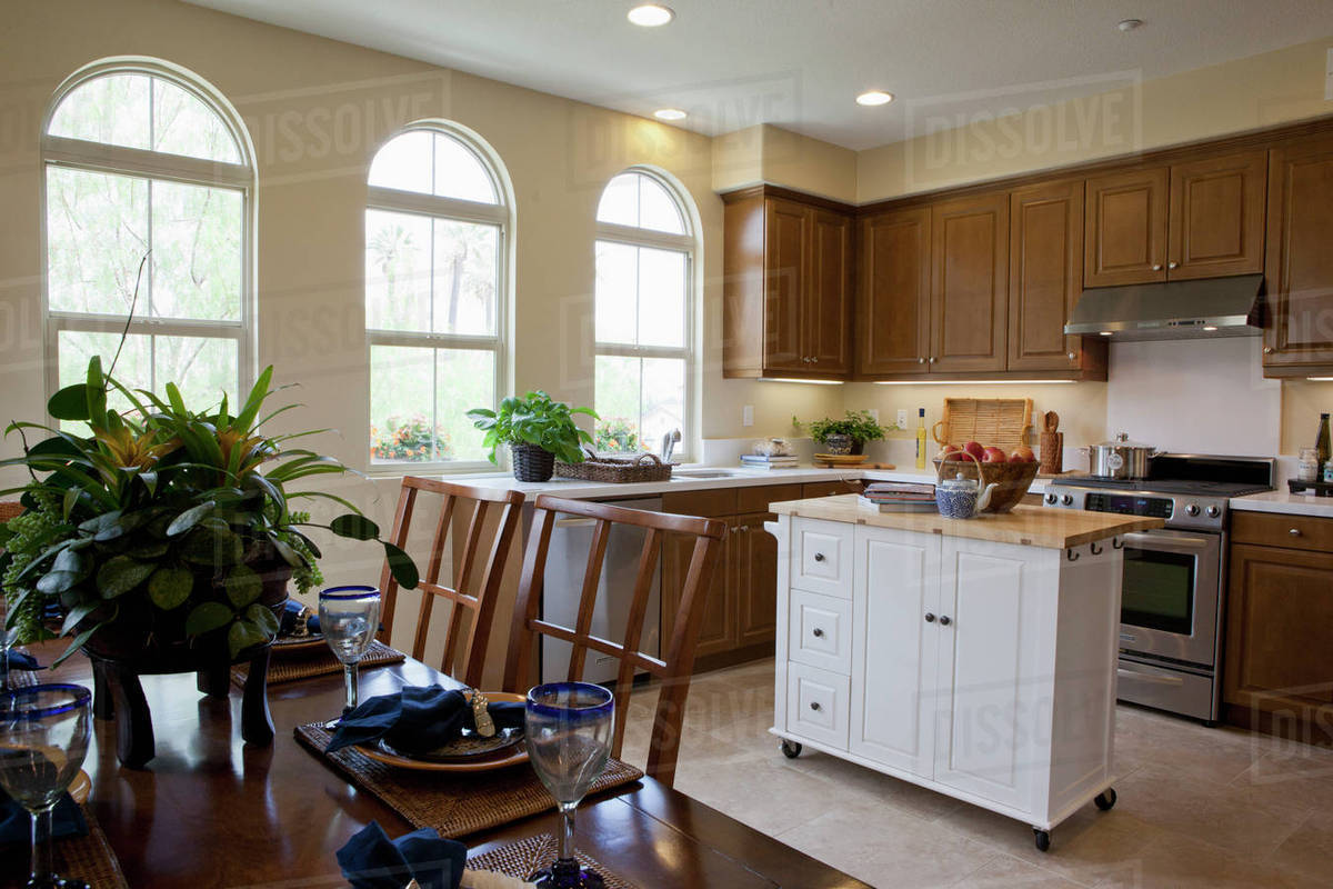 Split-level open plan dining area and kitchen at home - Royalty-free ...