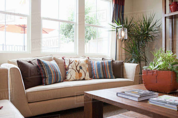 Couch against window in the living room at home - Royalty-free Stock ...