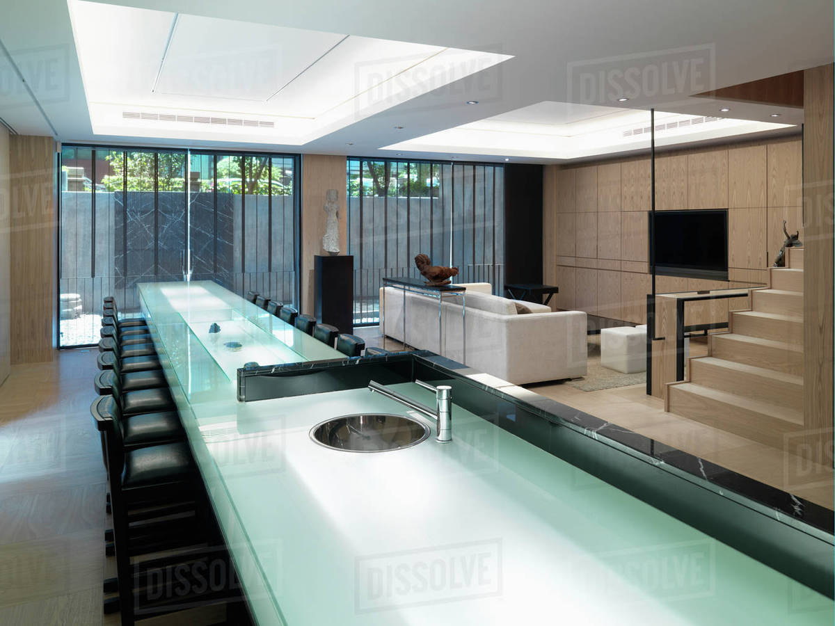 Long illuminated conference table - Royalty-free Stock Photo | Dissolve