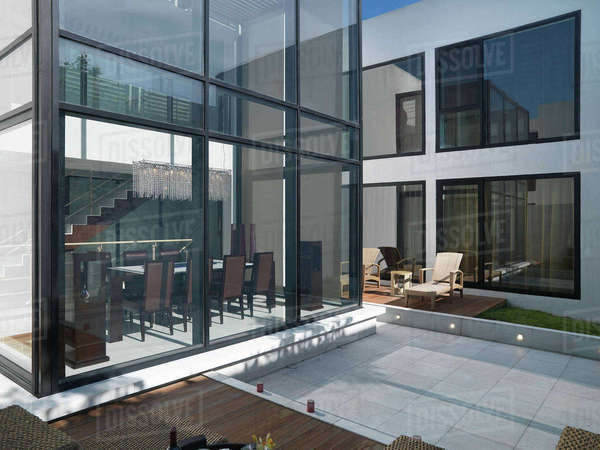 Exterior of modern glass home - Royalty-free Stock Photo | Dissolve