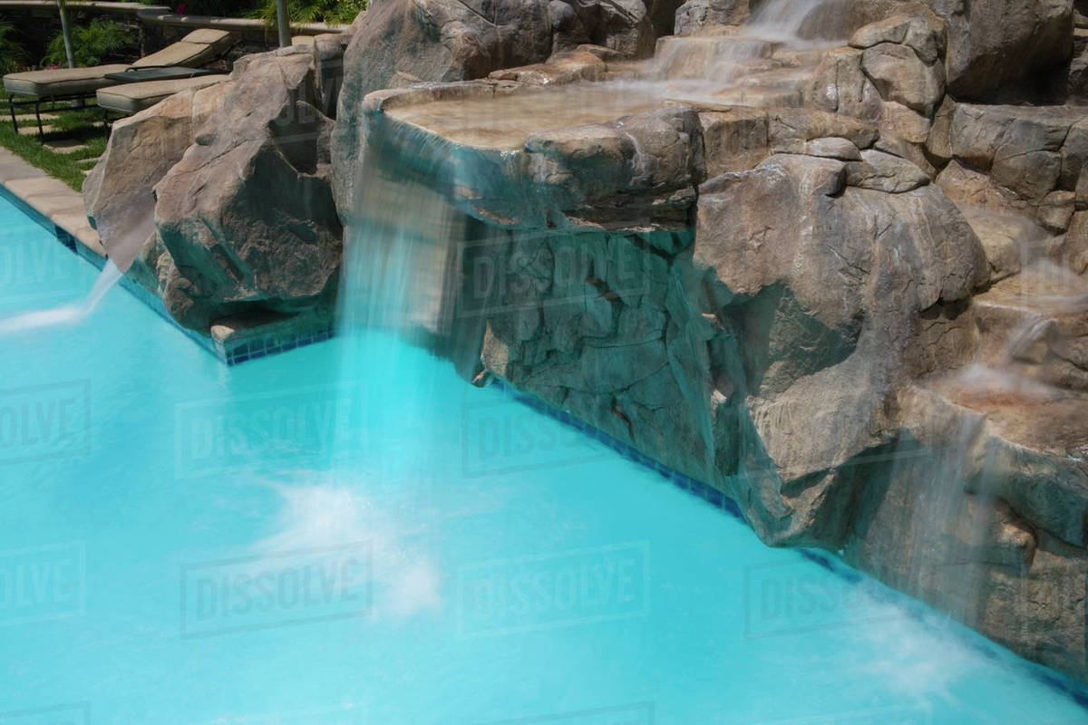 Rock Waterfall to Swimming Pool - Royalty-free Stock Photo | Dissolve