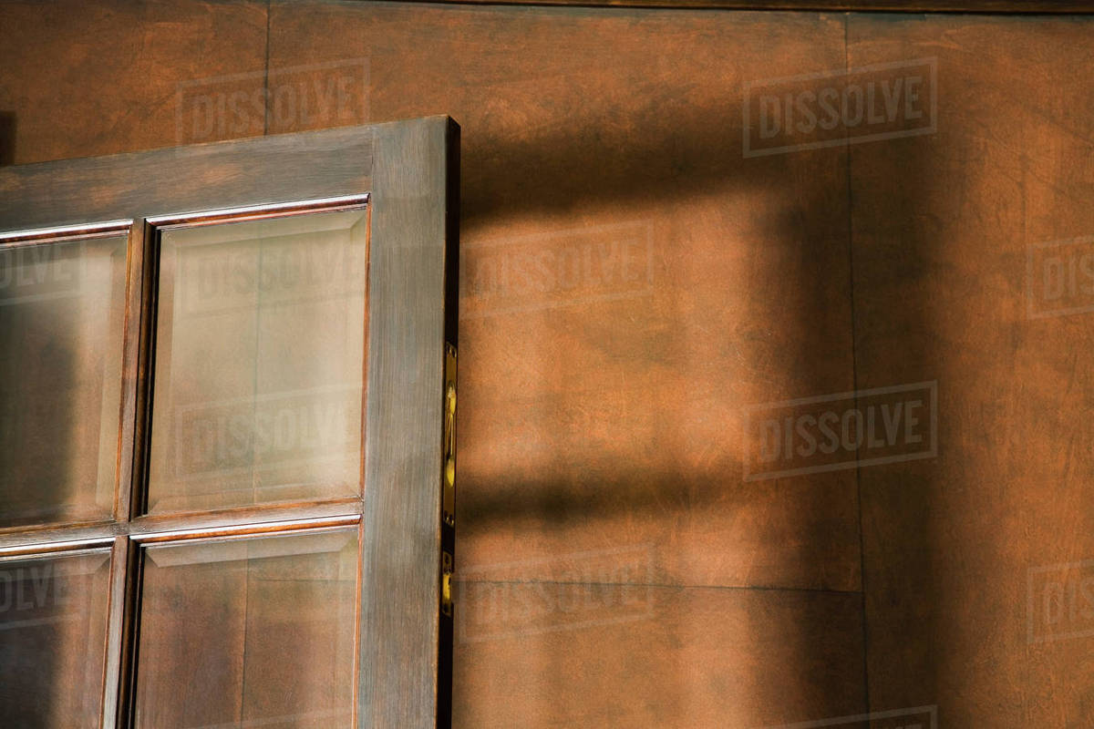 Open Door and Shadow - Royalty-free Stock Photo | Dissolve