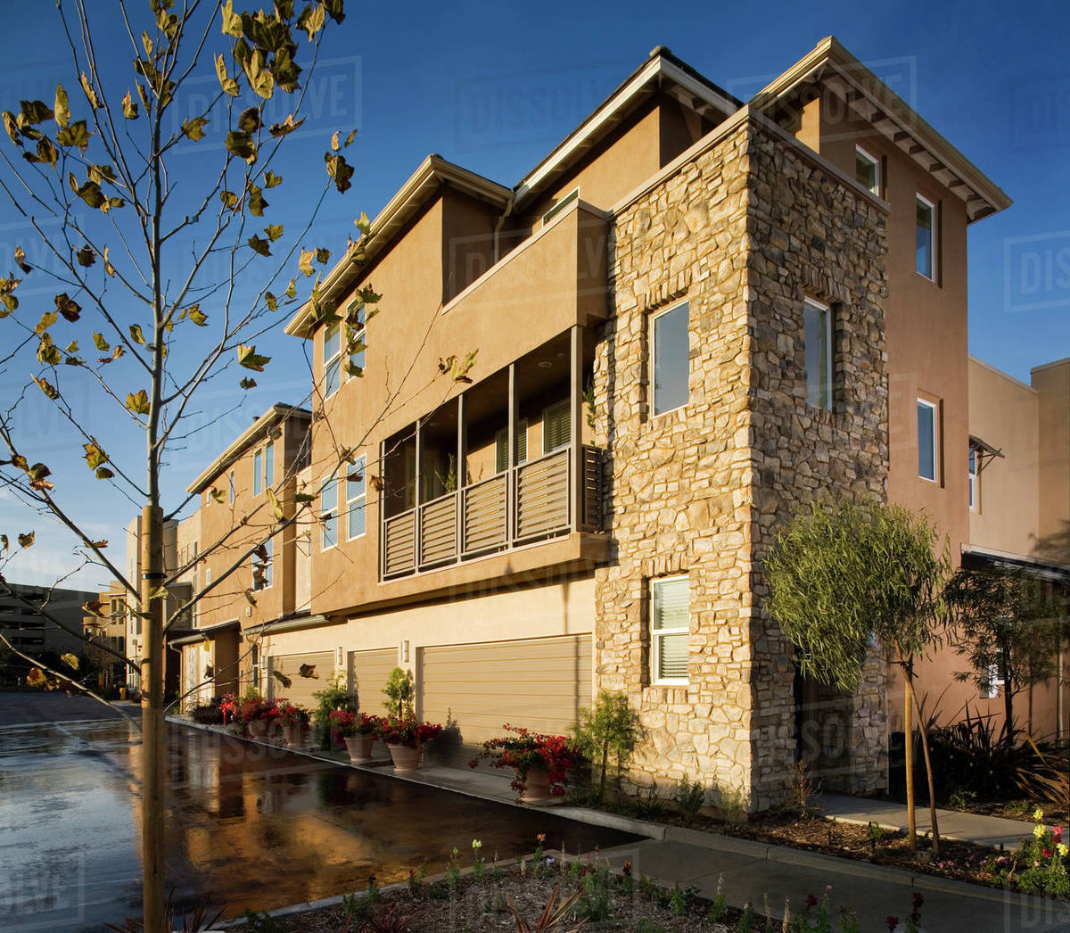 Rear of contemporary townhomes and garages - Royalty-free Stock Photo ...