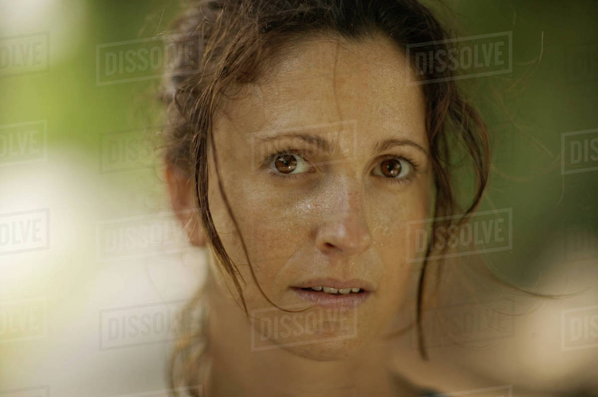 Sweating woman - Stock Photo - Dissolve