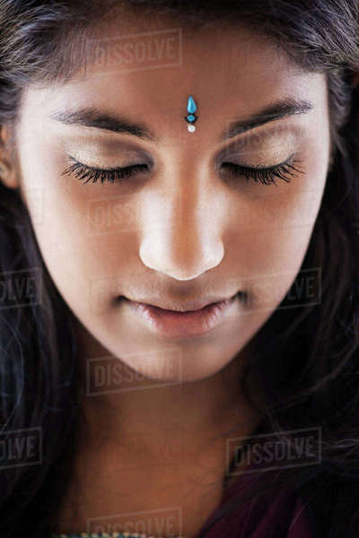 Indian woman with jewel on forehead - Royalty-free Stock Photo | Dissolve
