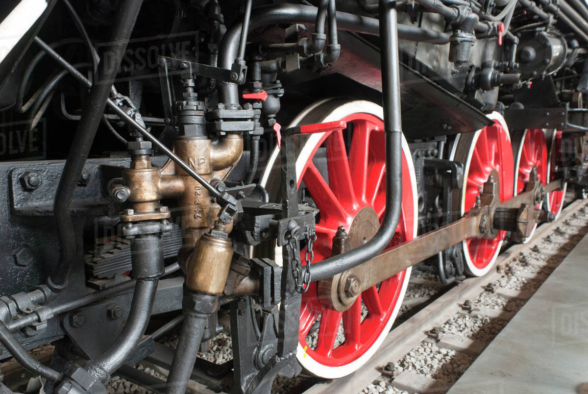 Close up of the rows of steel wheels of a locomotive train - Royalty ...