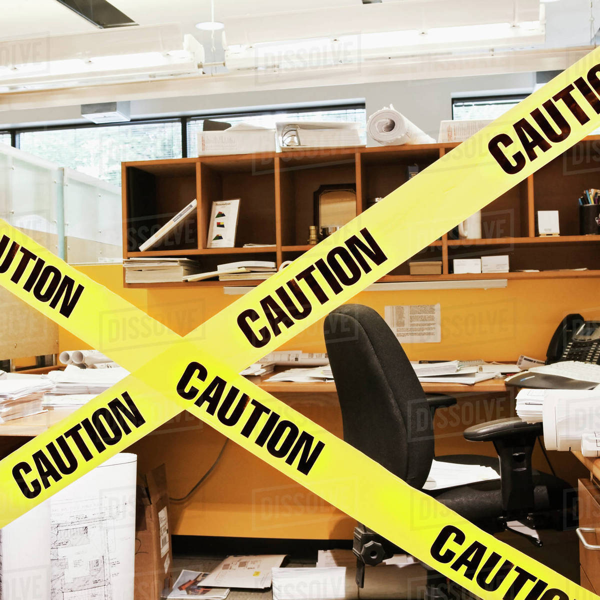 Caution Tape Blocking a Cubicle Entrance - Stock Photo - Dissolve