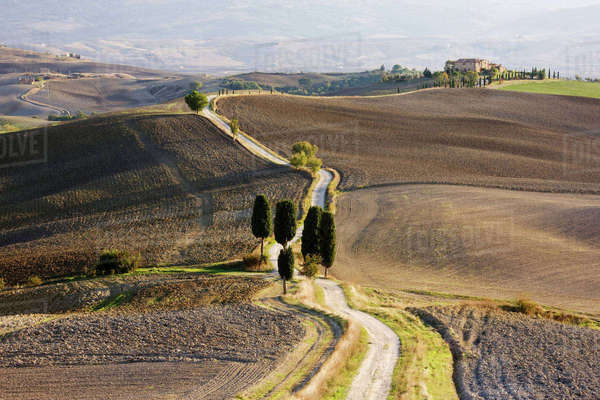 Home in Isolated Landscape - Royalty-free Stock Photo | Dissolve