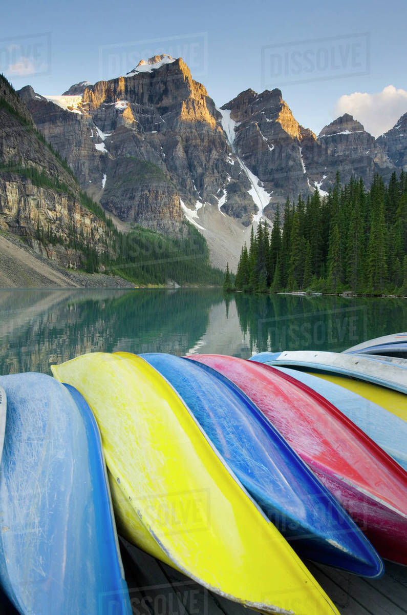 Colorful canoes on dock of Moraine Lake - Royalty-free Stock Photo ...