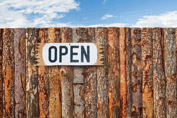 Open sign on wooden fence - Royalty-free Stock Photo | Dissolve