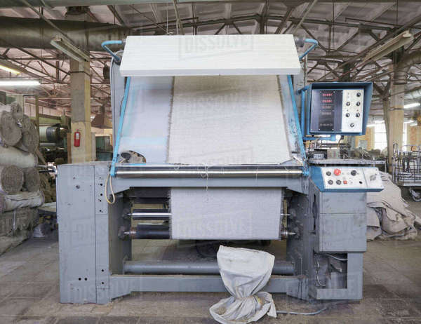 Canvas Trimming Machine - Stock Photo - Dissolve