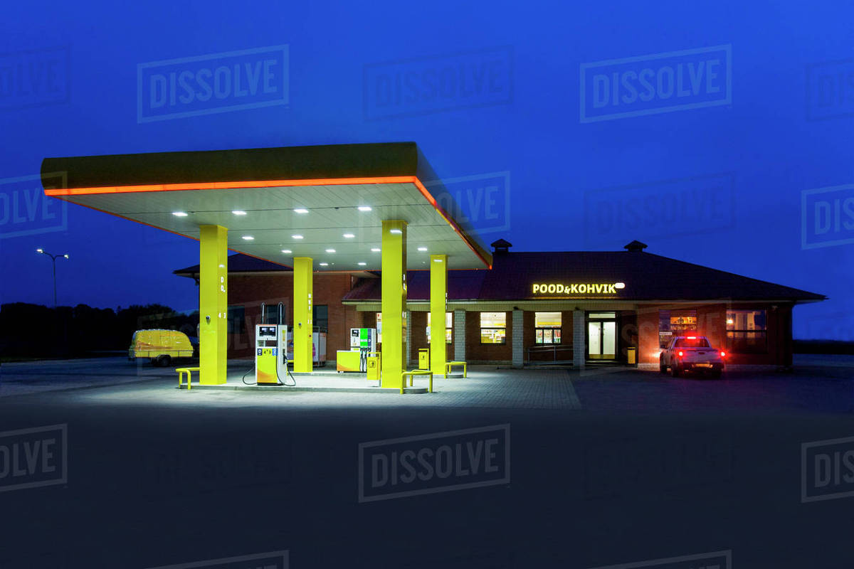 A roadside garage at night - Stock Photo - Dissolve