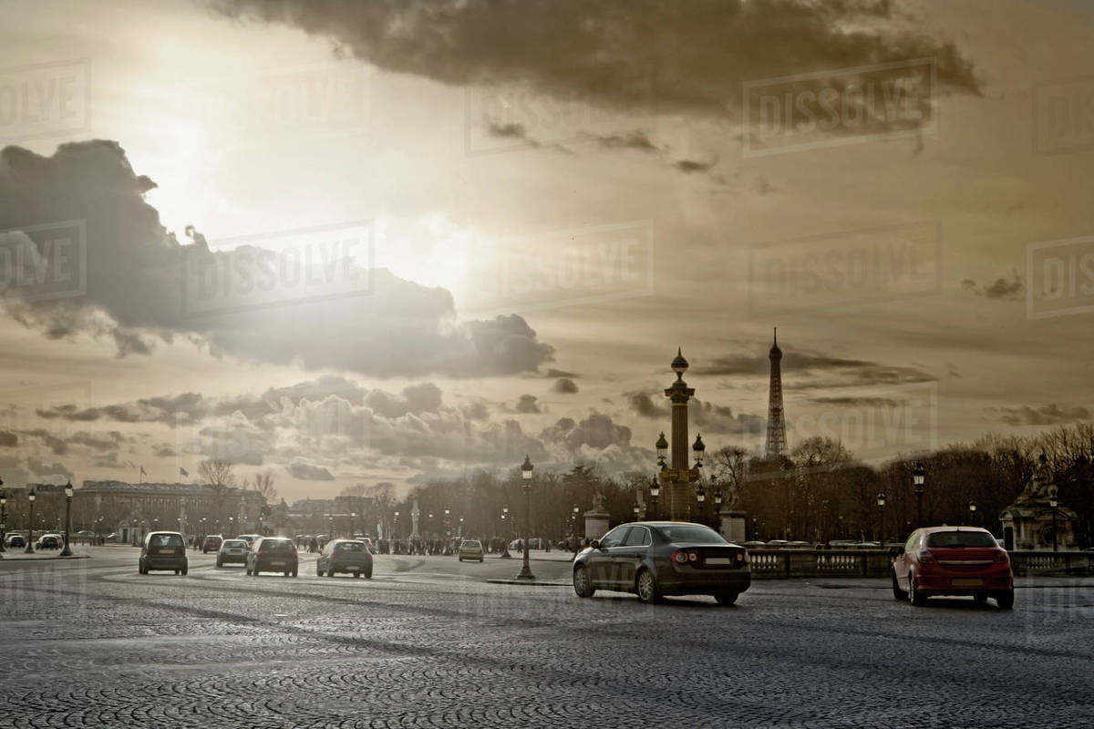 Cars driving on city street, Paris, France - Royalty-free Stock Photo ...