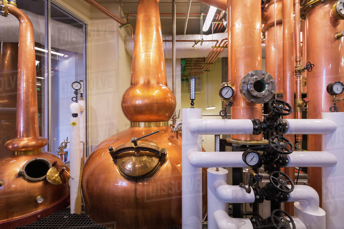 Copper stills in distillery - Royalty-free Stock Photo | Dissolve