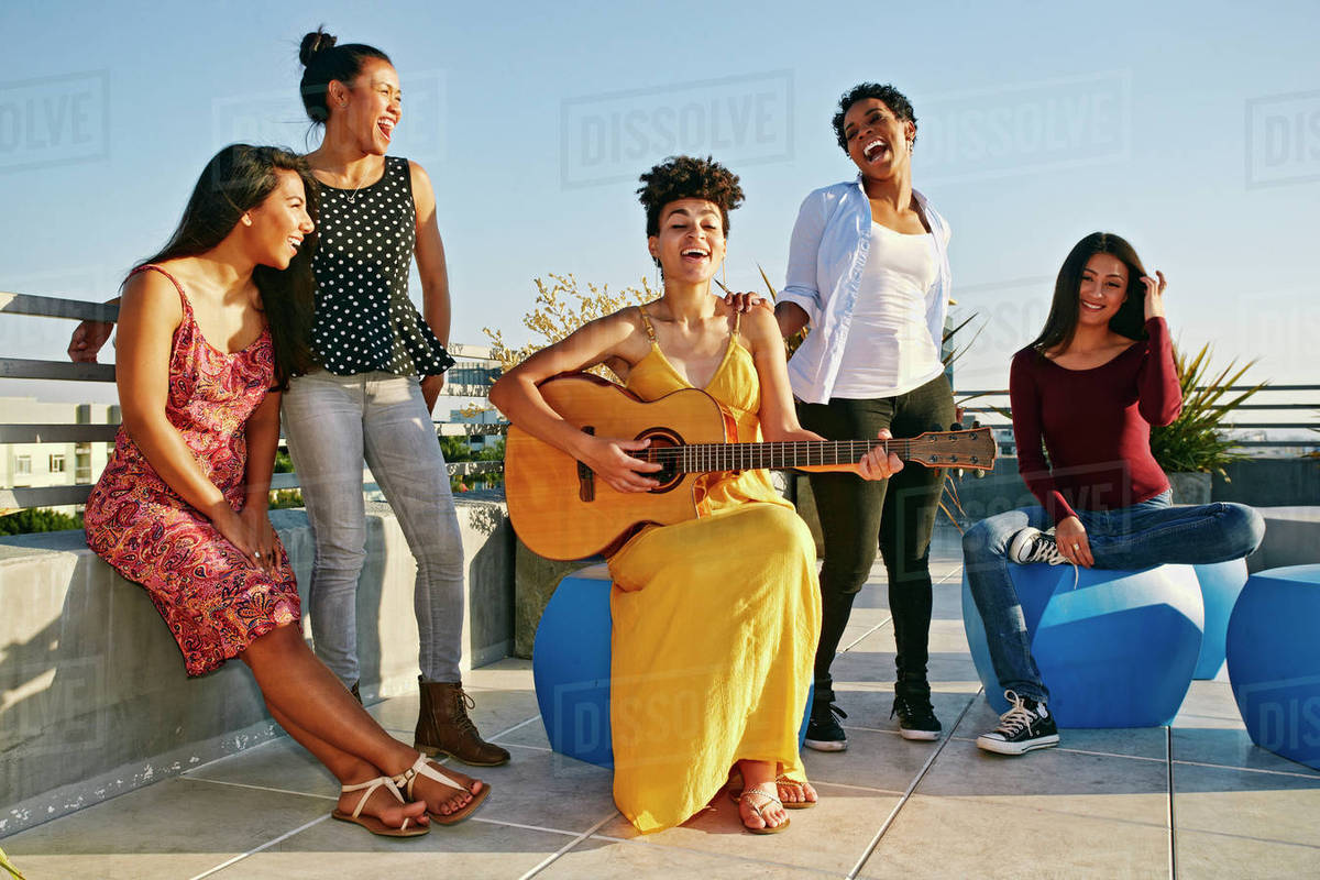 Women playing music and singing on urban rooftop - Royalty-free Stock ...