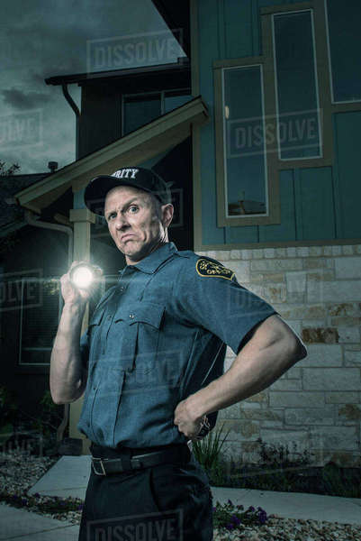 Caucasian security officers posing with flashlight - Royalty-free Stock ...